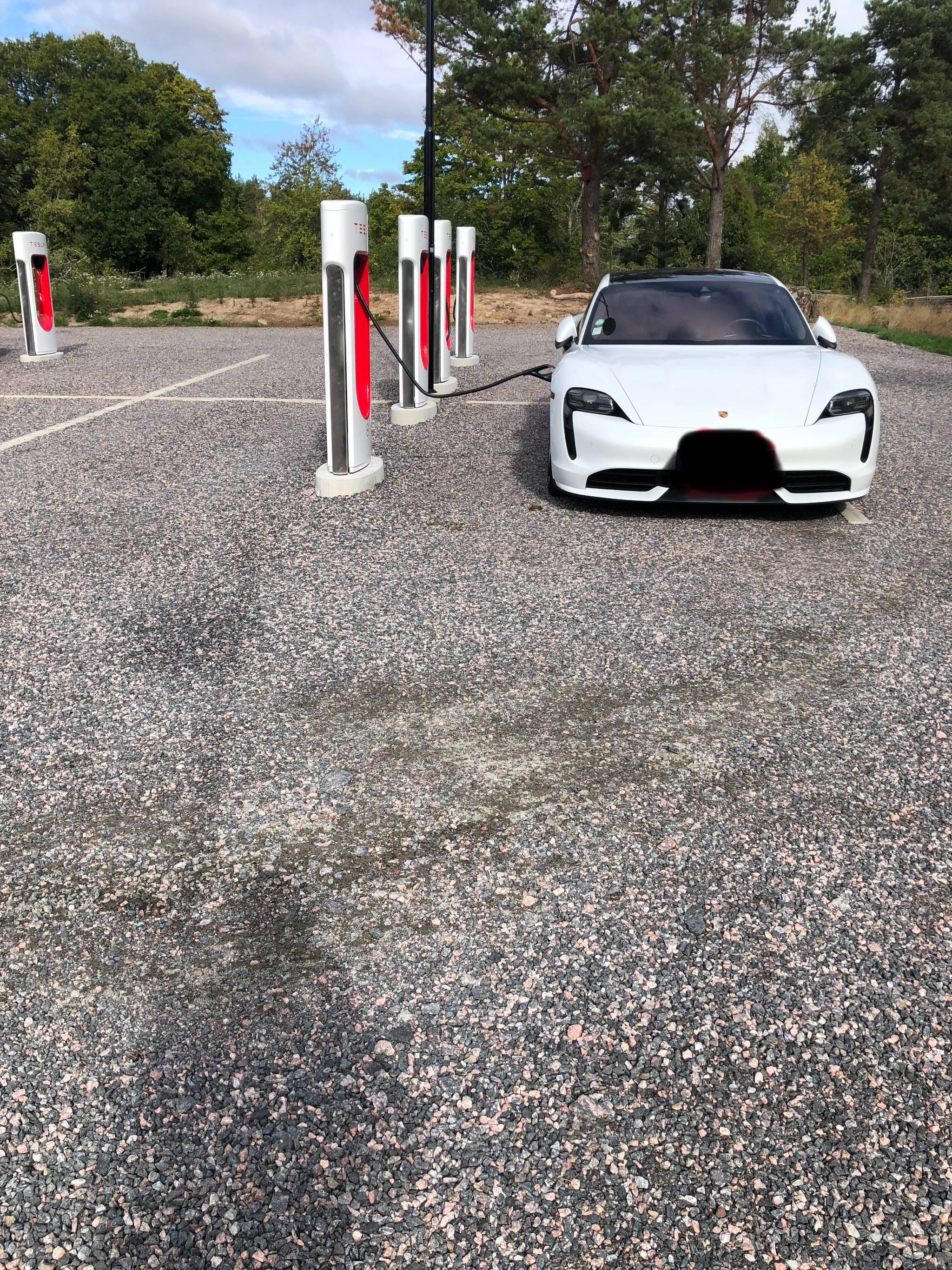 Charge Taycan At Tesla Station