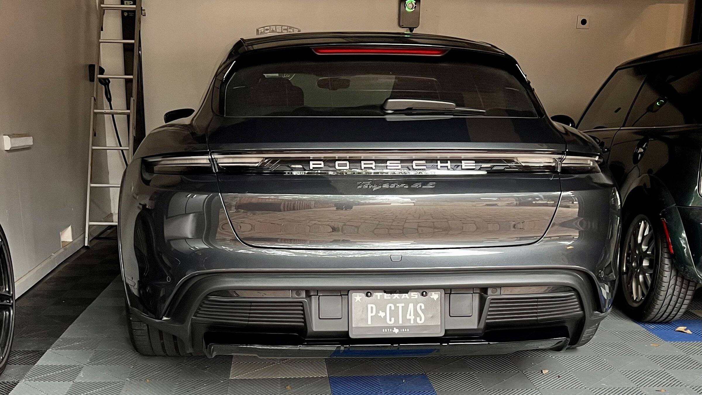 Decals on my modded license plate area | TaycanForum -- Porsche Taycan ...