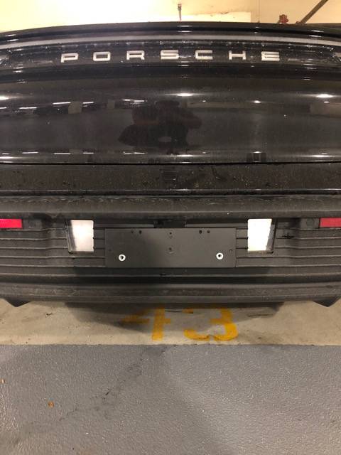 Decals on my modded license plate area | TaycanForum -- Porsche Taycan ...