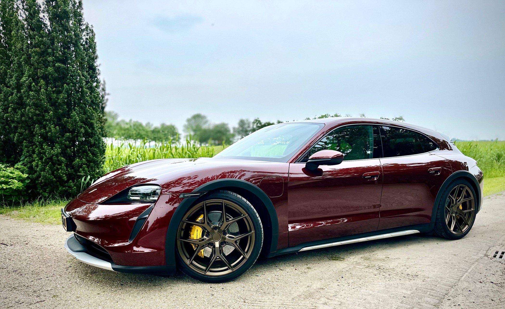 Cherry Red Taycan 4 Cross Turismo + Bronze 21” Vossen HF5 and yellow ...